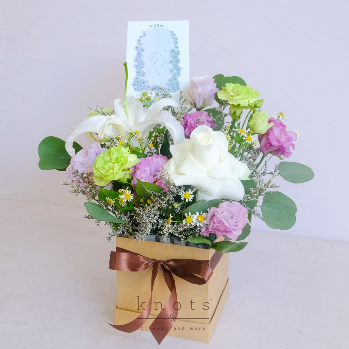 Cosmic Virgo (White Lily, White Rose, and Green Carnation Arrangement ...