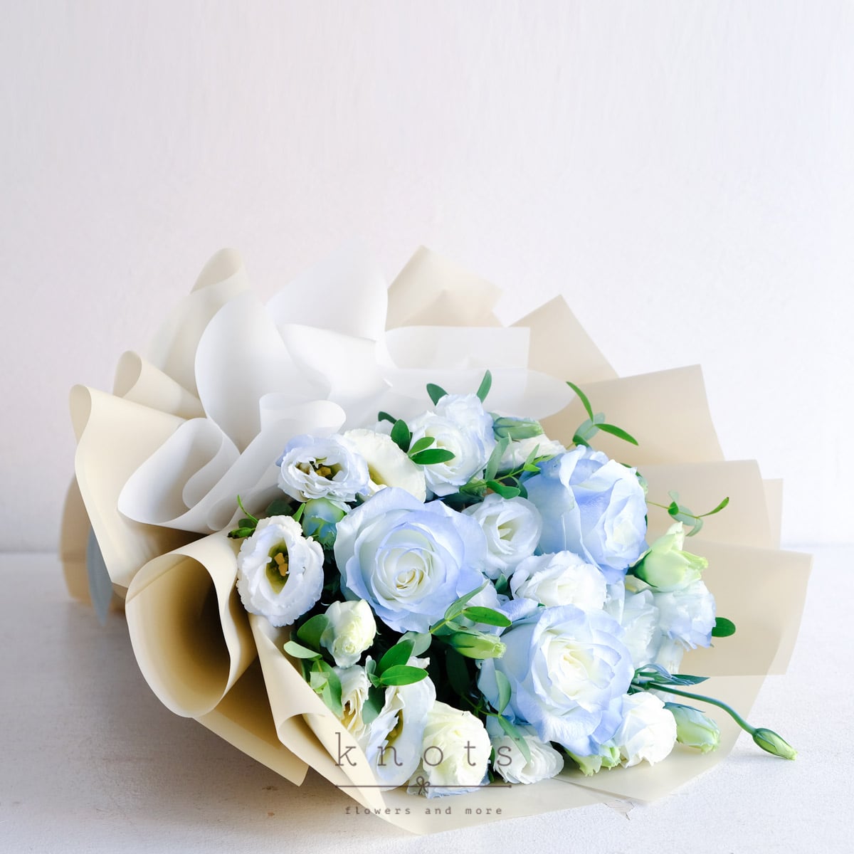Kristia (Light Blue Sprayed White Roses Bouquet) | Knots.ph